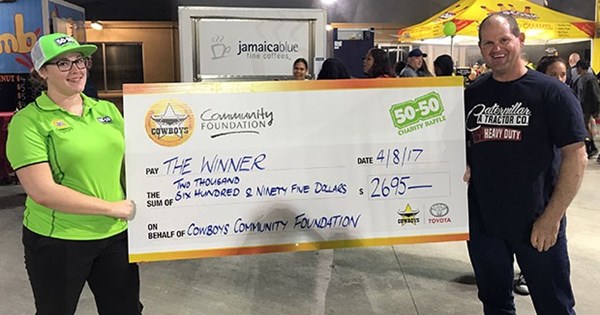 50-50 charity raffle ticket pays off! | Cowboys